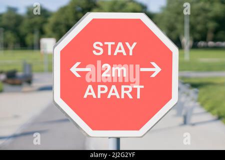 stay two meters apart outdoor sign Stock Photo - Alamy