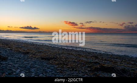 Beach sunset over Admiralty Inlet, Whidbey Island, Washington Stock ...