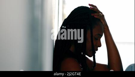 Worried black woman feeling anguish. anxious African female Stock Photo ...