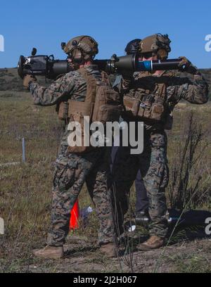 Rockets fired by a U.S. Marine Corps M142 High Mobility Artillery ...
