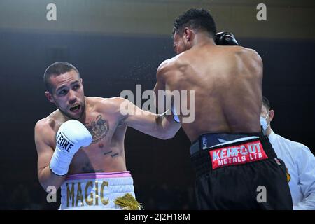 BARCELONA, SPAIN - APRIL 1: (R-L) Kyle Lomotey punches Jhon Jader ...