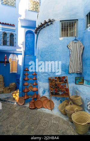 Morocco, Chefchaouen, Cobblestone alley and souvenirs for sale Stock ...