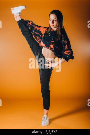 Artistic dance moves performed by an young sporty girl Stock Photo - Alamy