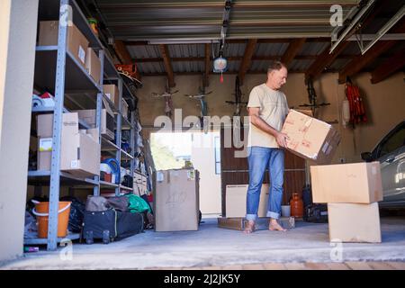 moving, things in boxes, garage sale, flower in a pot. Copy space Stock ...