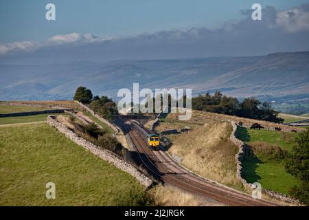 Freightliner class 66 locomotive 66951 hauling a merry go round coal ...