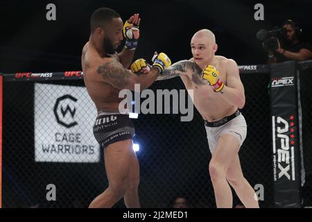 Aleksi Mantykivi punches Jeanderson Castro during the Cage Warriors 136 ...