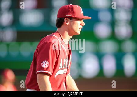 Arkansas third baseman Cayden Wallace (7) tries to put the tag on ...