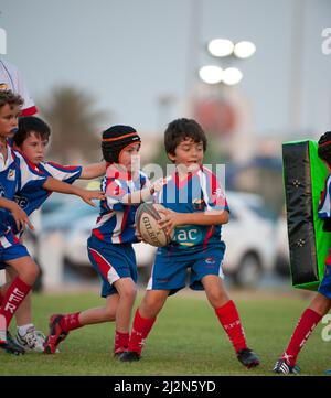 young kids playing rugby Stock Photo - Alamy