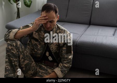 Upset soldier remembering terrifying war, suffering ptsd, psychological ...