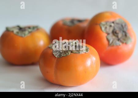 Persimmon or Amarphal is a fruit native to Japan, China, Korea, Burma ...