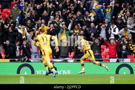 Sutton United's Craig Eastmond (right) celebrates scoring their side's ...