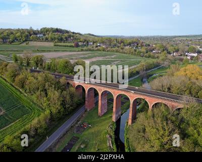 Aerial drone view of Eynsford viaduct, arched brick bridge for railway ...