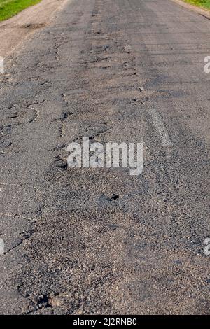 poor quality of the highway on which holes and potholes have formed, an ...