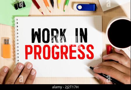 Work in Progress text written on a notebook with pencils Stock Photo ...