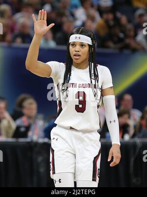 South Carolina guard Destanni Henderson, left, drives to the hoop ...