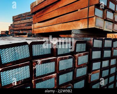 Stacked railway sleepers made of oak hardwood material ready for ...