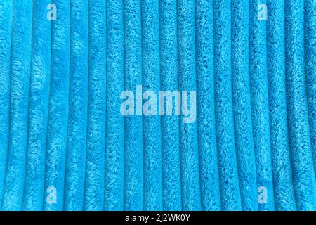 Fuzzy blue for plaid. Shaggy blanket background. Close up. Selective ...