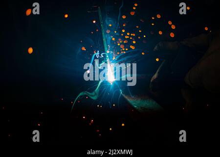 Metal welding. Fire from operation of welding machine. Manufacture of ...