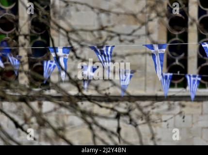 Festive Greek flags hanging on the main square of Andritsaina ...