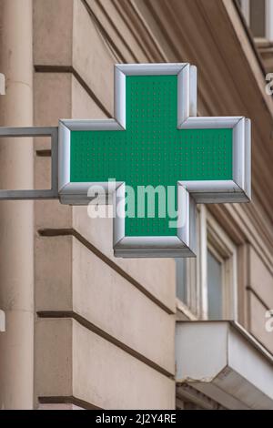 Big Led Green Cross Sign at Pharmacy Building Stock Photo - Alamy