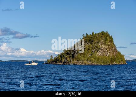 Boat tour to Ukonkivi – Sacred Island of the Sami in Lake Inari, Inari ...