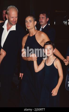 Bruce Willis and Demi Moore attend the premiere of "Pulp Fiction" at ...