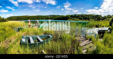 people relax at the lake Narlay in the untouched nature Stock Photo - Alamy