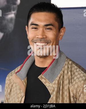 JB Tadena arrives at the AMBULANCE Los Angeles Premiere held at the ...