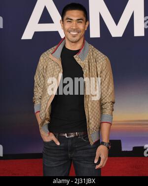 JB Tadena arrives at the AMBULANCE Los Angeles Premiere held at the ...