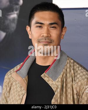 JB Tadena arrives at the AMBULANCE Los Angeles Premiere held at the ...