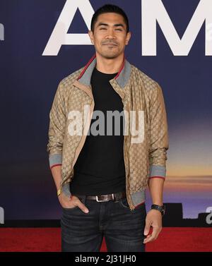 JB Tadena arrives at the AMBULANCE Los Angeles Premiere held at the ...