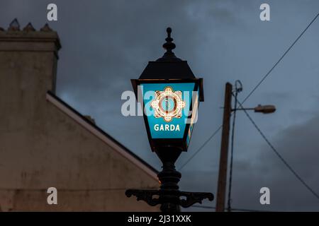 Garda Sign outside rural Garda Station Stock Photo - Alamy