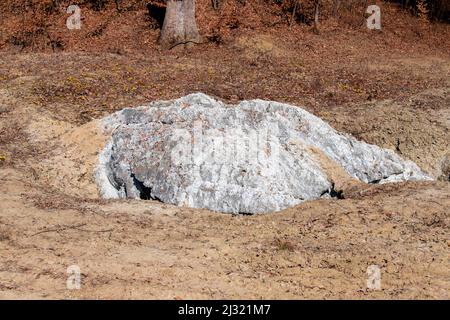 A close-up of a salt rock coming out from the ground Stock Photo - Alamy