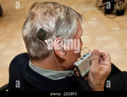 A cochlear implant is an implanted electronic hearing device designed ...