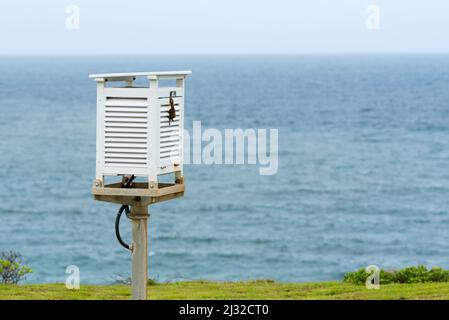 instrument shelter on a weather station with various meteorological ...
