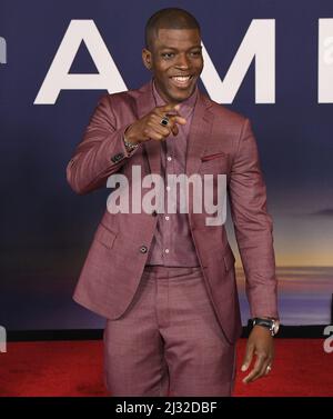 Cedric Sanders arrives at the AMBULANCE Los Angeles Premiere held at ...
