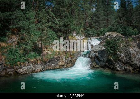 Waterfall with pool on the Cascada da Bernina hiking trail at ...
