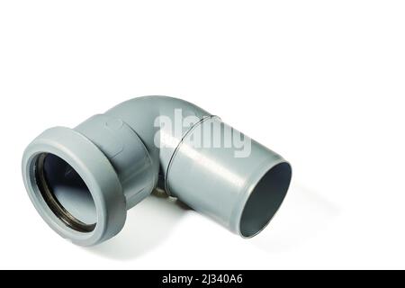 Close up view of plumbing corner piece of plastic pipe isolated on a ...
