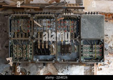 The rusty broken metal box for f distribution of an electricity ...