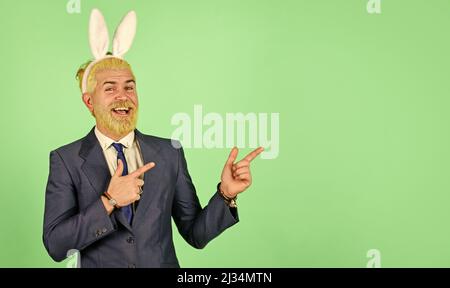 Funny boss. Easter activities for office. Businessman wear bunny ...