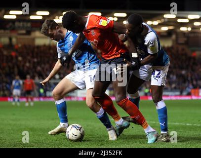 Jeando Fuchs of Peterborough United (right) reacts during the Sky Bet ...
