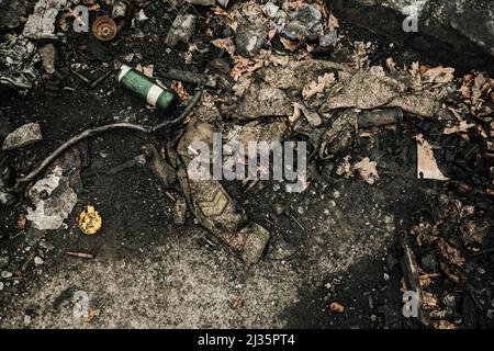 The charred remains of a village destroyed in a raid by Mau Mau ...