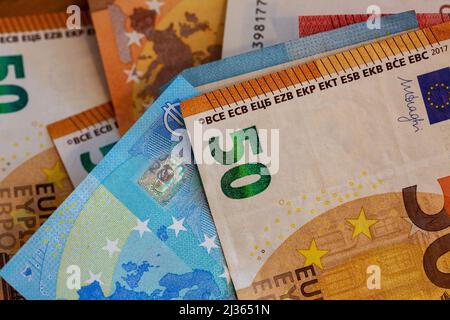 Three 100 Euro banknotes, 300 Euro, isolated on 100% white background ...