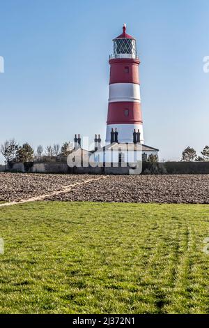 Red and White candy striped lighthouse at Happisburgh, East Norfolk ...