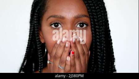 African girl surprise reaction, black teen young woman close-up face ...