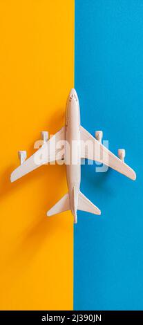 Blue background with toy airplane, yellow wooden car and text beach ...