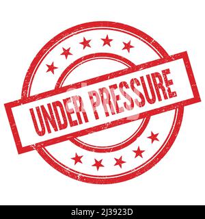 UNDER PRESSURE text written on blue grungy vintage round stamp Stock ...