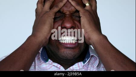 Stressed out African man reaction. Frustrated black guy emotion Stock ...