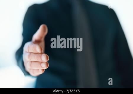 Giving you a warm welcome. Cropped shot of an unrecognizable ...