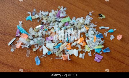 Marco top shot of a pile of microplastics. Concept for water pollution ...